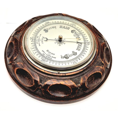 A Vintage Wall-Hanging Barometer in Working Order. 30cm diameter.