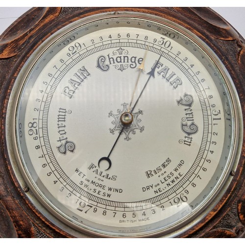 A Vintage Wall-Hanging Barometer in Working Order. 30cm diameter.