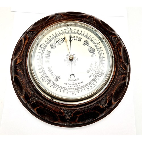 A Vintage Wall-Hanging Barometer in Working Order. 30cm diameter.