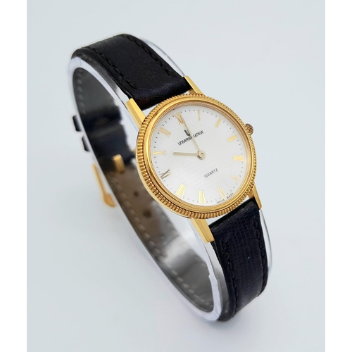 A Gold Plated Universal Quartz Ladies Watch. Black leather strap. Gold ...