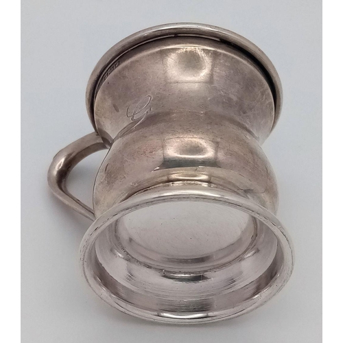 A VERY CUTE MINI SILVER TANKARD . 38.2gms 5cms tall approx