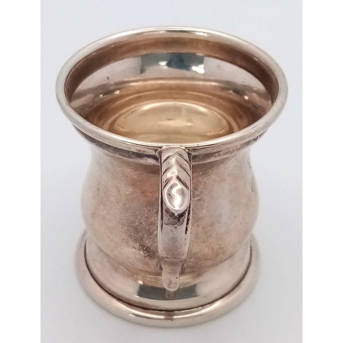 A VERY CUTE MINI SILVER TANKARD . 38.2gms 5cms tall approx