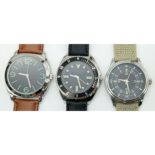 Three Military designed Navy Diver Quartz Watches Comprising 1) An ...