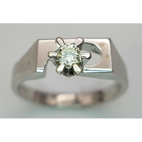 An 18K White Gold Diamond Solitaire Ring. 0.15ct round brilliant cut ...
