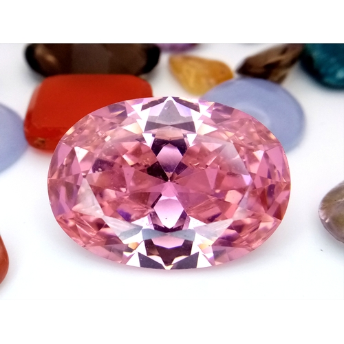 An assorted collection of gemstones. Total weight 61G. Please see ...