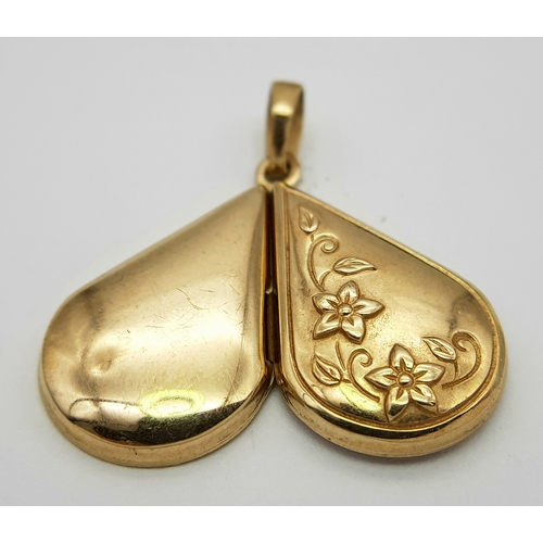 A 9K YELLOW GOLD, VINTAGE , PEAR SHAPED LOCKET. 1.3G. SC 8073