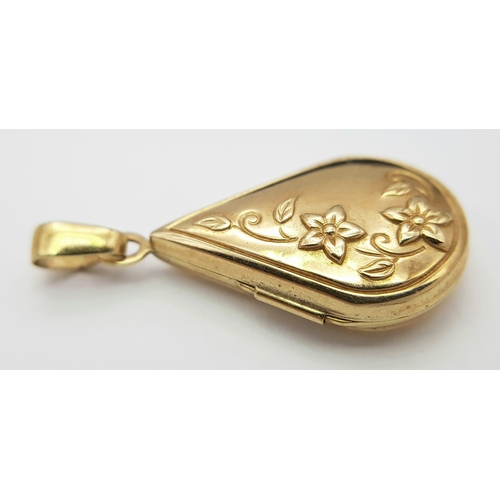 A 9K YELLOW GOLD, VINTAGE , PEAR SHAPED LOCKET. 1.3G. SC 8073
