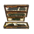 A group of four boxed Mainline Railways 00 gauge locomotives, including ...