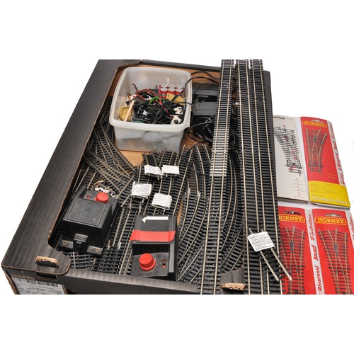 A large collection of 00 gauge railway track and electrical accessories ...