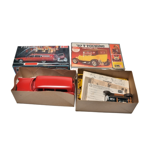 A duo of 1/25 scale plastic car model kits including a Jo-Han Fire ...