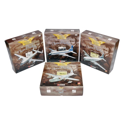A group of four Corgi Aviation Archive Classic Propliner die-cast ...
