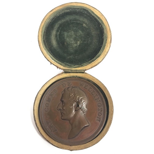A BRONZE MEDAL, THE DUKE OF WELLINGTON. The obverse with a portrait of ...