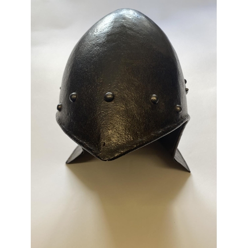 A 16TH CENTURY TYPE OPEN FACED HELMET. A French style open faced helmet ...