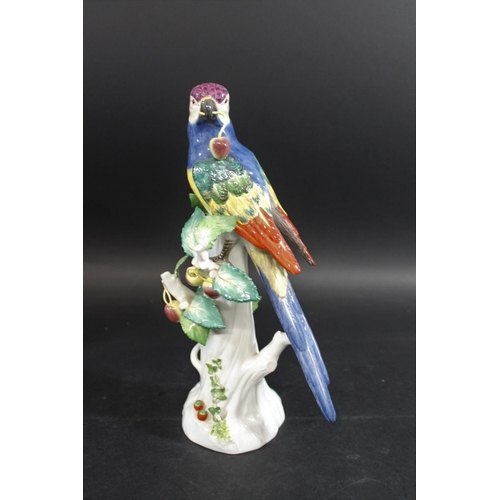 MEISSEN PARROT 20thc, the Parrot brightly painted and holding a cherry ...