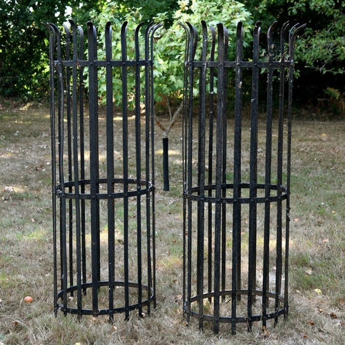 A PAIR OF WROUGHT IRON TREE GUARDS. late 19th or early 20th century ...