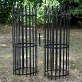 A PAIR OF WROUGHT IRON TREE GUARDS. late 19th or early 20th century ...