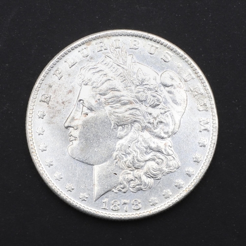 A UNITED STATES OF AMERICA MORGAN DOLLAR, 1878. A United States silver ...