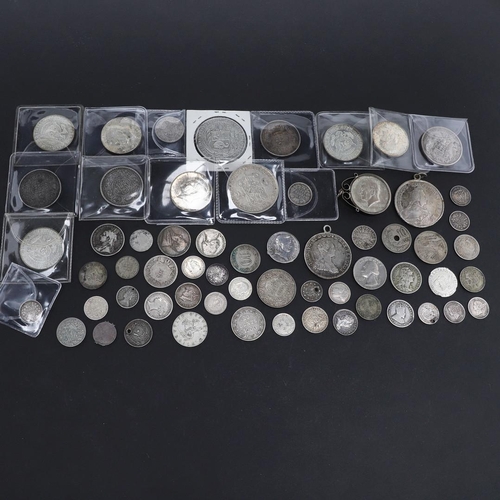 A MIXED COLLECTION OF WORLD SILVER COINAGE. A collection of silver ...