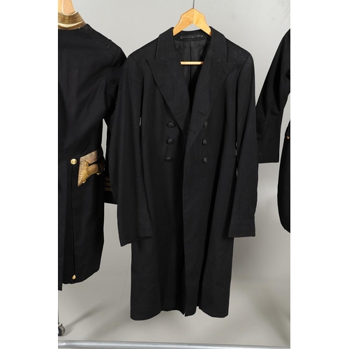 A COLLECTION OF EARLY 20TH CENTURY NAVAL UNIFORM. A Royal Navy frock ...