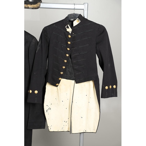 A COLLECTION OF EARLY 20TH CENTURY NAVAL UNIFORM. A Royal Navy frock ...