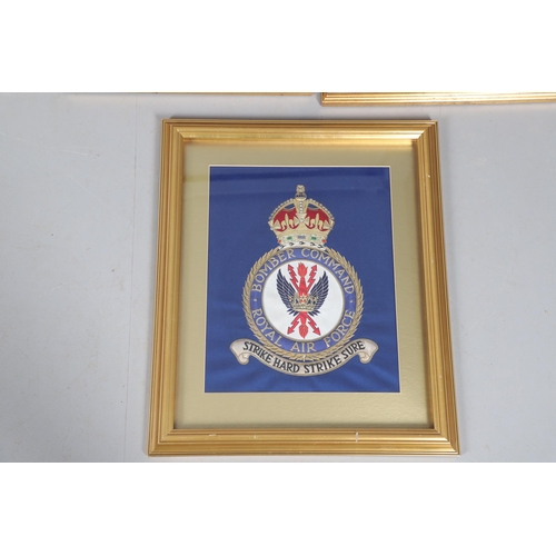 A COLLECTION OF FRAMED NEEDLEWORK MILITARY AND ROYAL CRESTS. A framed ...