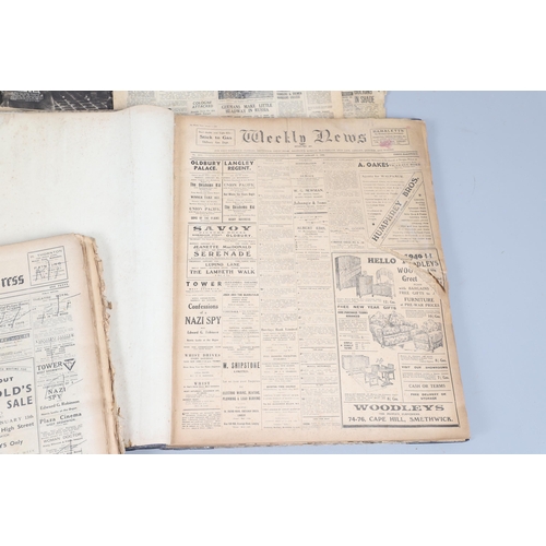 WAR TIME NEWSPAPERS: TWO VOLUMES OF 'WEEKLY NEWS' FOR 1940. A large ...