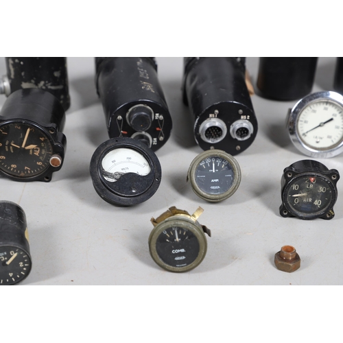 A COLLECTION OF AVIATION DIALS TO INCLUDE AUTOMATIC PILOT, TANK GAUGES ...