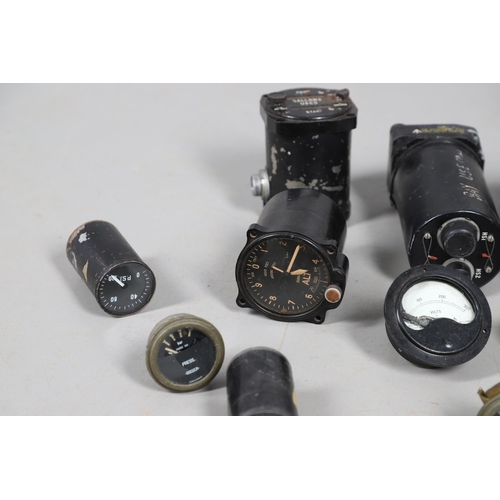 A COLLECTION OF AVIATION DIALS TO INCLUDE AUTOMATIC PILOT, TANK GAUGES ...