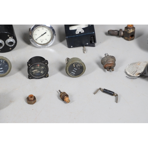 A COLLECTION OF AVIATION DIALS TO INCLUDE AUTOMATIC PILOT, TANK GAUGES ...