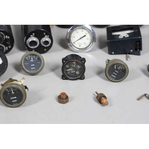 A COLLECTION OF AVIATION DIALS TO INCLUDE AUTOMATIC PILOT, TANK GAUGES ...