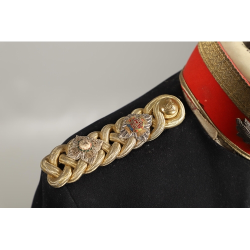 A VICTORIAN ROYAL ARTILLERY MESS JACKET. A black mess jacket with red ...