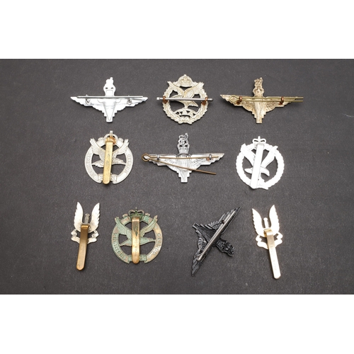 A COLLECTION OF TWELVE CAP BADGES FOR AIRBORNE GROUPS. A collection of ...