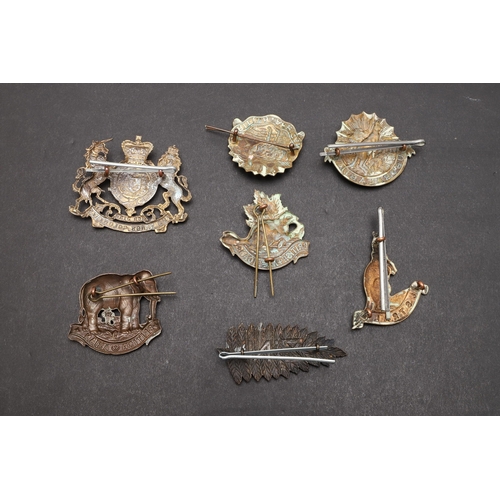 A COLLECTION OF SEVEN CAP BADGES FOR KING'S COLONIAL TROOPS 1901-1908 ...