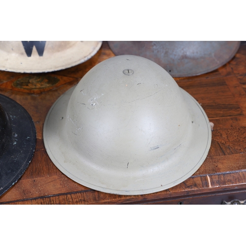 A COLLECTION OF SECOND WORLD WAR HOME FRONT HELMETS. An interesting ...