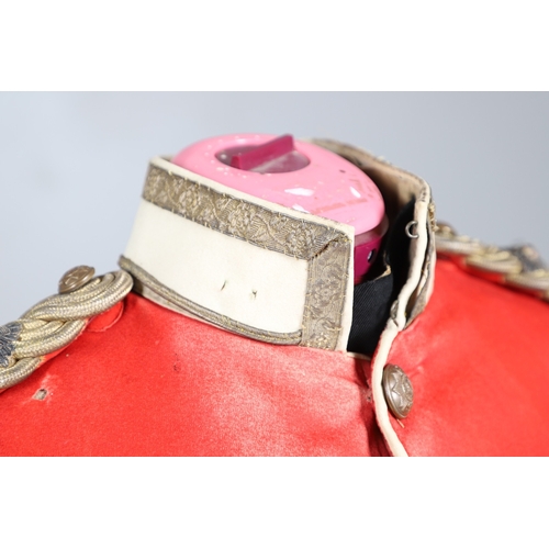 AN EARLY 20TH CENTURY SCARLET TUNIC FOR THE WORCESTER REGIMENT. A ...