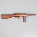 A MID 20TH CENTURY CHILD'S TOY GUN. A home-made child's toy gun with ...