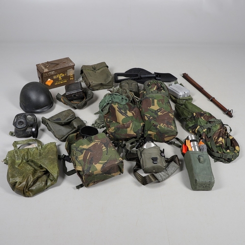 A COLLECTION OF POUCHES AND PLASTIC HELMET. A plastic helmet, headgear ...