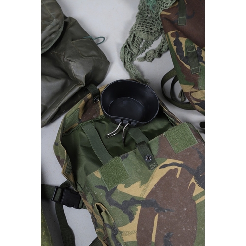 A COLLECTION OF POUCHES AND PLASTIC HELMET. A plastic helmet, headgear ...