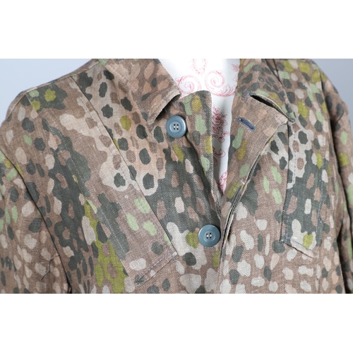 A GERMAN WAFFEN-SS PARATROOPERS STYLE CAMOUFLAGE SMOCK. A camouflage ...