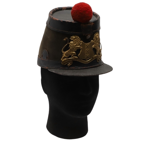 A LATE 19TH CENTURY DUTCH POLICE SHAKO. A police shako with brass plate ...