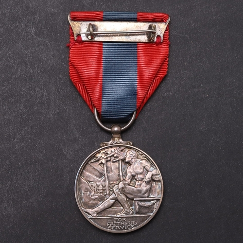 A GEORGE VI IMPERIAL SERVICE MEDAL. A George VI Imperial Service Medal ...