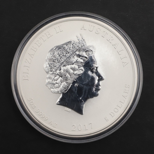 A COLLECTION OF SILVER ISSUES, AUSTRALIA AND OTHERS. Two coins from the ...
