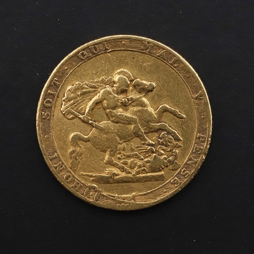 A GEORGE III SOVEREIGN, 1820. A George III Sovereign, laureate head r ...