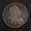 A CHARLES II SHILLING, 1663. A George II Shilling, first laureate and draped bust r. reverse with cr