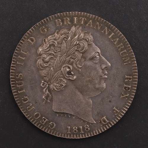 A GEORGE III CROWN, 1818. A George III Crown, laureate head r. dated ...