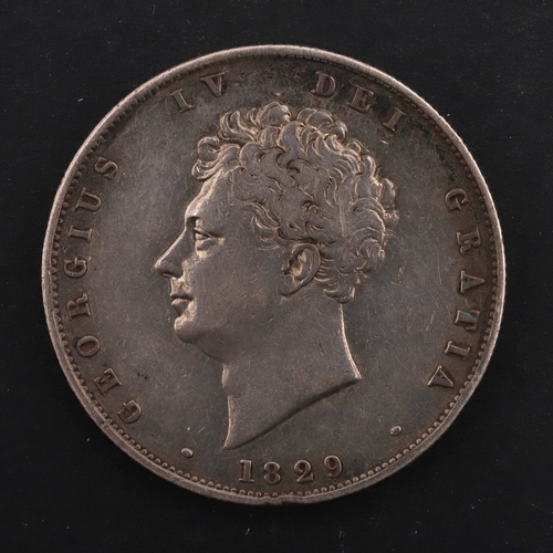 A GEORGE IV HALFCROWN, 1829. A George IV Halfcrown, bare head l ...