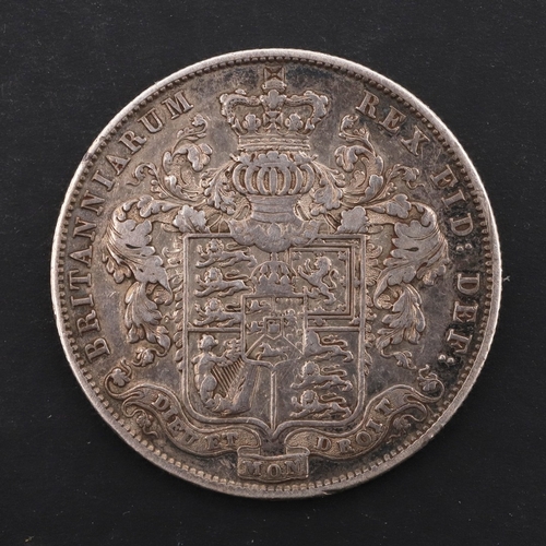 A GEORGE IV HALFCROWN, 1829. A George IV Halfcrown, bare head l ...