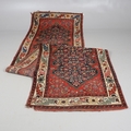 A PAIR OF BIDJAR RUNNERS. Each with a deep Herati field centred by an ...