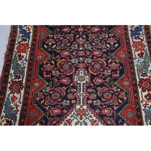 A PAIR OF BIDJAR RUNNERS. Each with a deep Herati field centred by an ...
