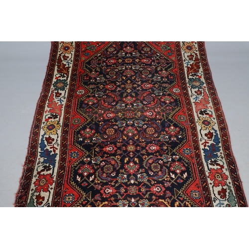 A PAIR OF BIDJAR RUNNERS. Each with a deep Herati field centred by an ...